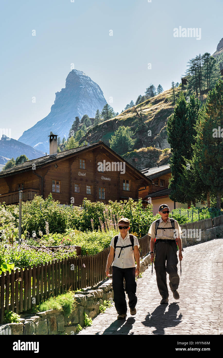 Zermatt, Switzerland - August 24, 2016: Senior Tourists in Zermatt with ...