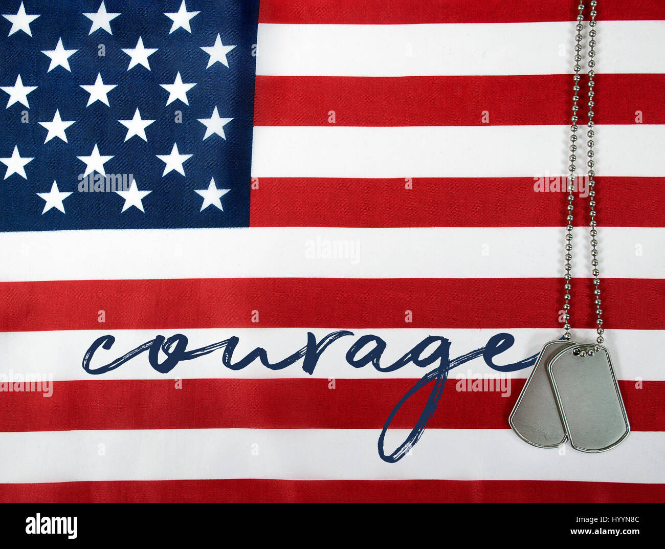 word courage on American flags with military dog tags Stock Photo - Alamy
