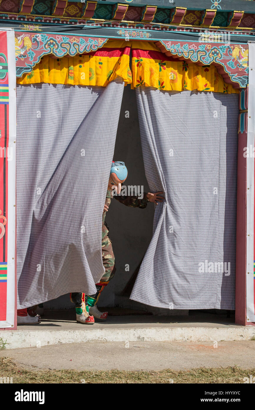 Masked Atsara at the annual Tsechu in the eastern village of Shongpu ...