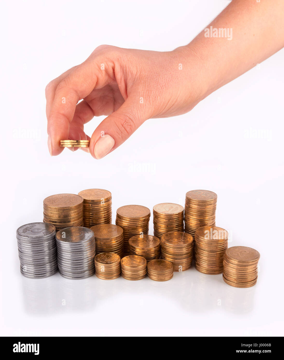 Woman hand with coins, close up Stock Photo - Alamy