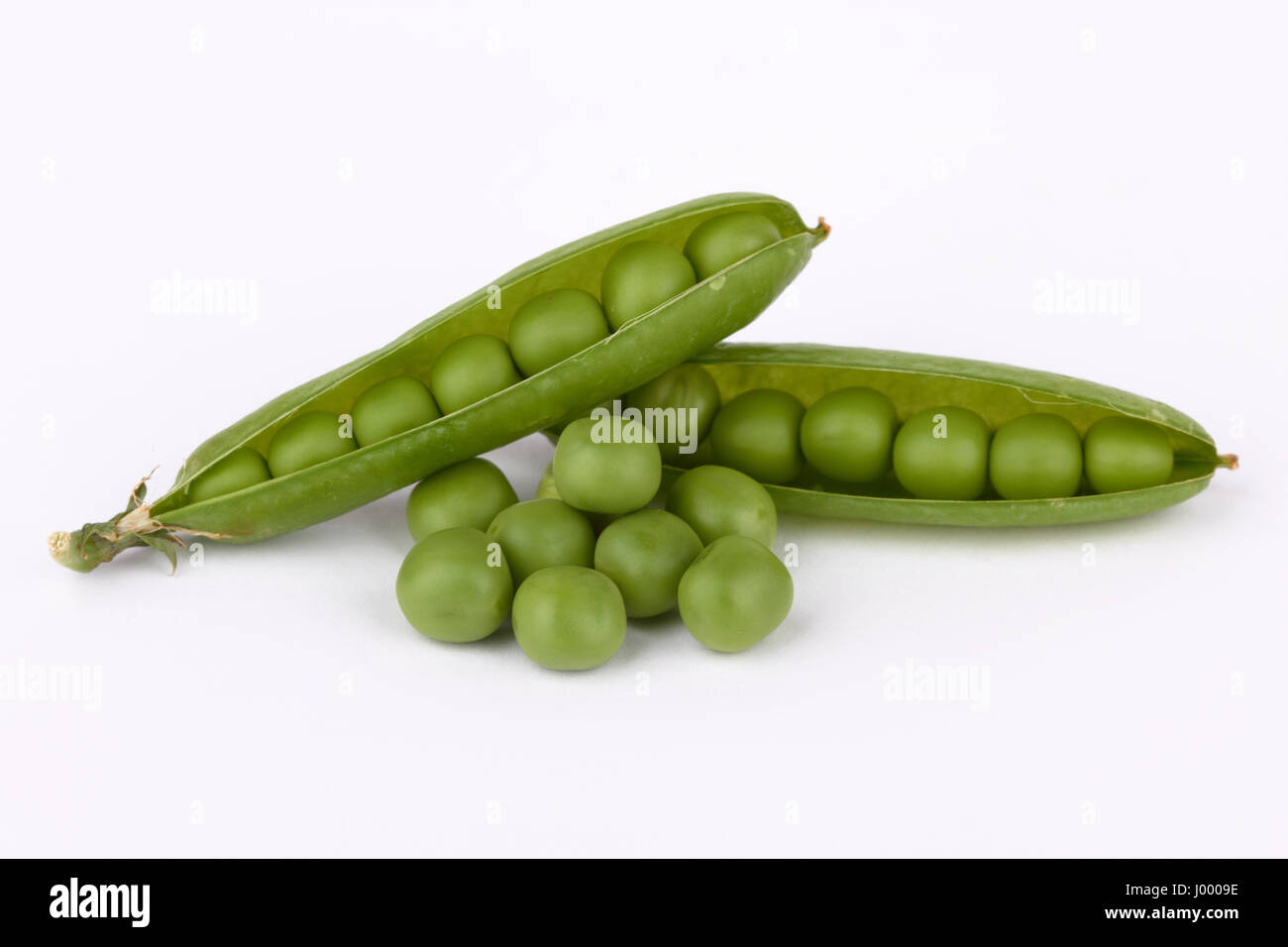 Fresh green pea pod on white background Stock Photo - Alamy