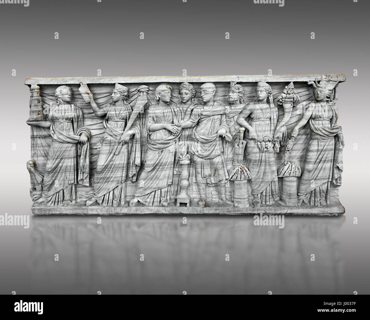 Roman relief sculpture sarcophagus showing a married couple with pagan ...