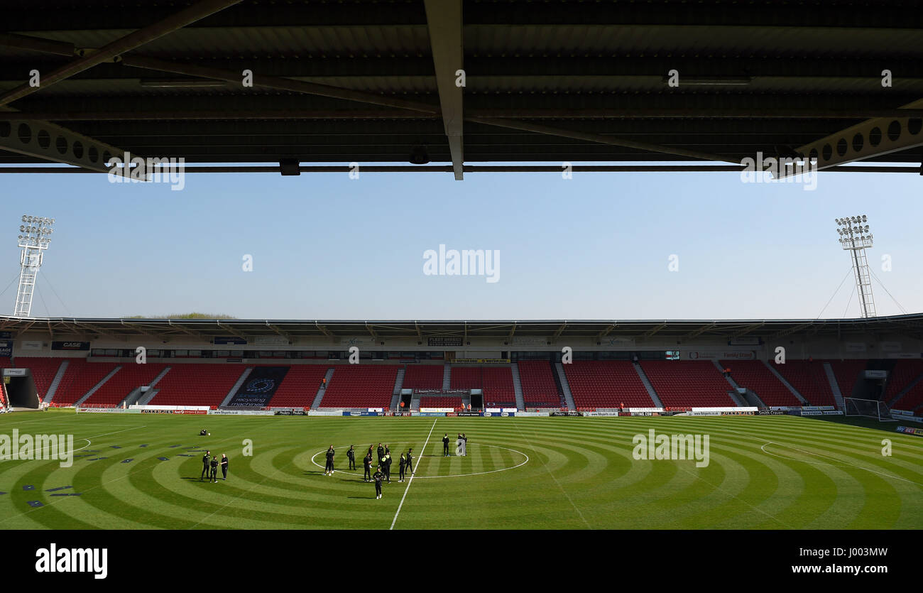 General view of the Keepmoat Stadium as players inspect the pitch ahead ...
