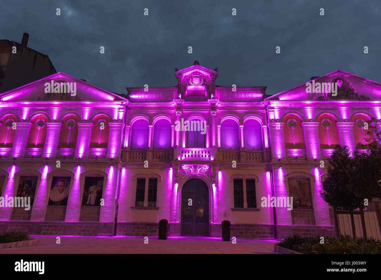 Library of Design School building at night in purple light against dark ...