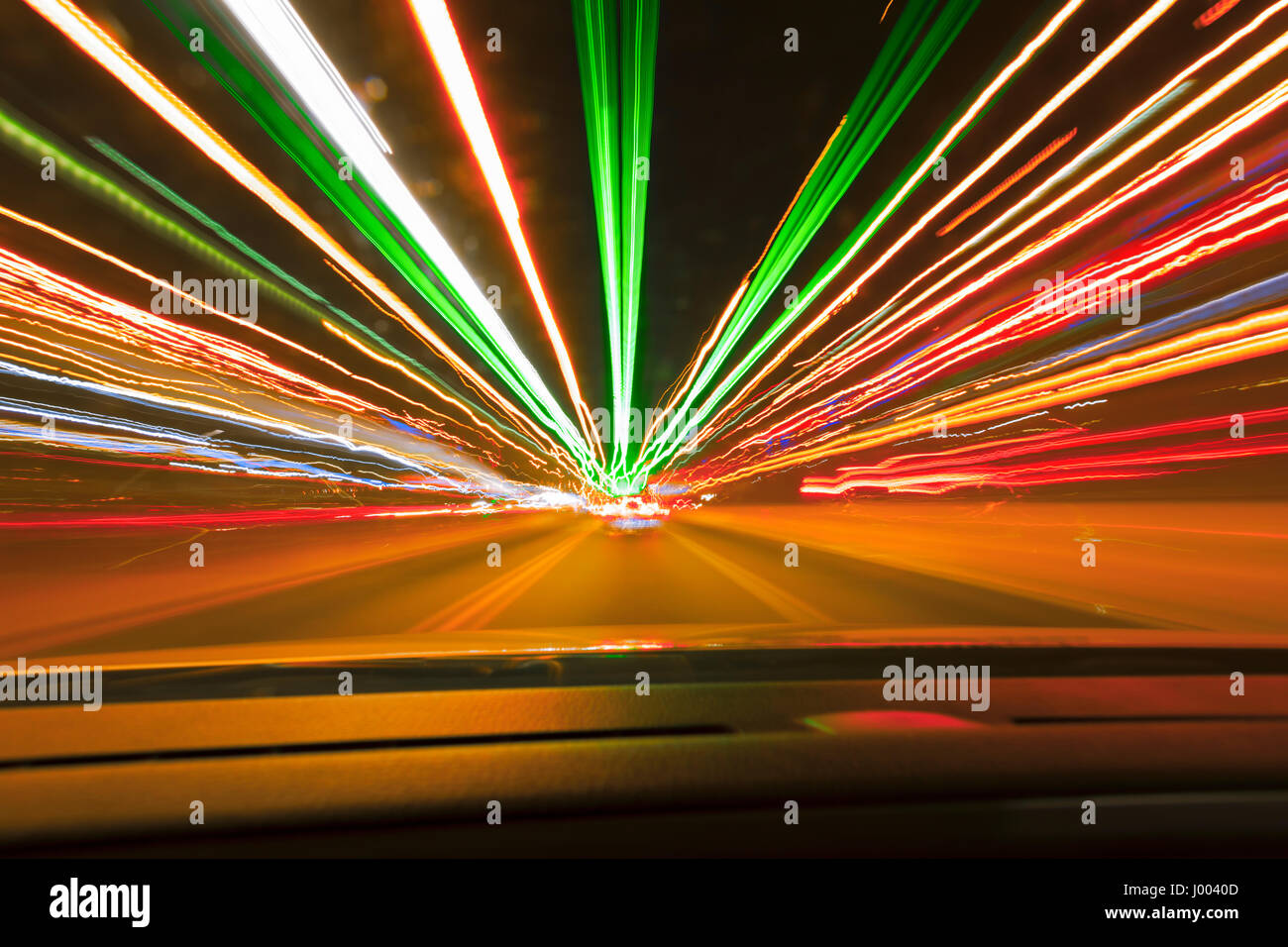 Long exposure speed car lights trails on a night highway Stock Photo ...