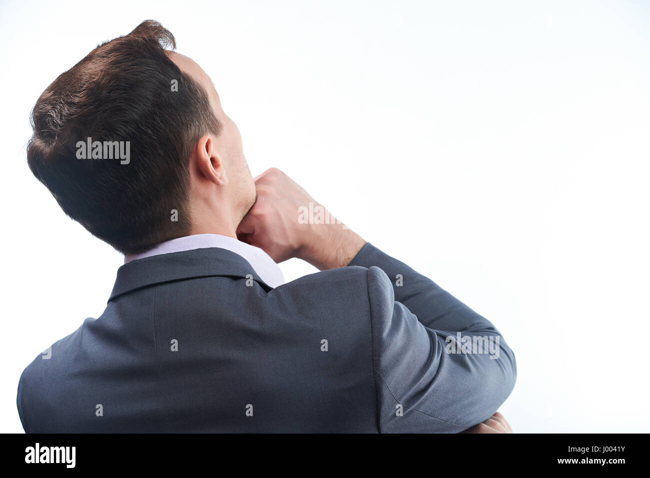 Business man think under idea. Back view of man solving problem Stock ...