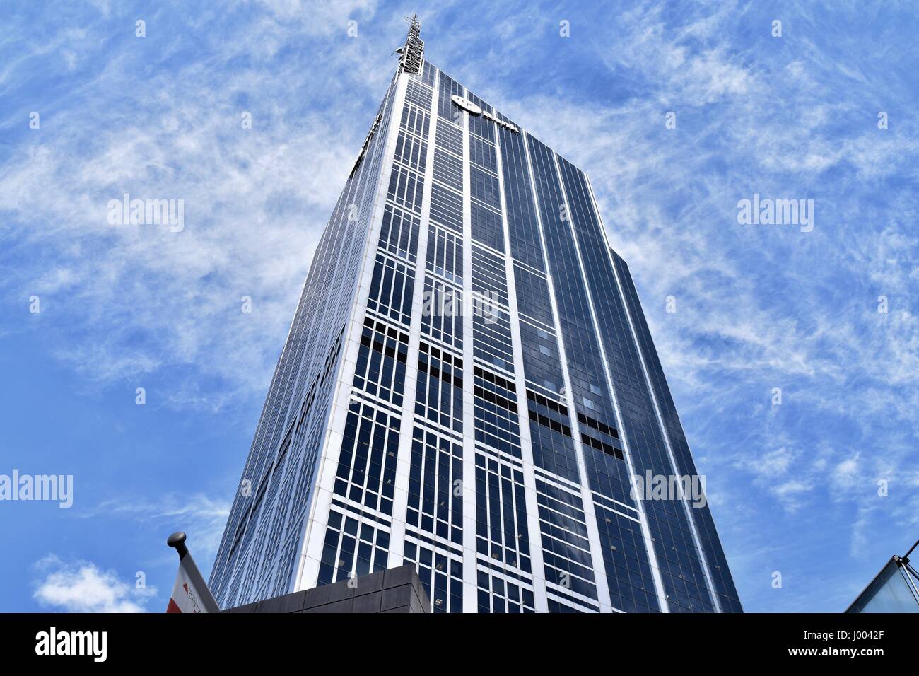 A low shot of a skyscraper towering in the sky Stock Photo - Alamy