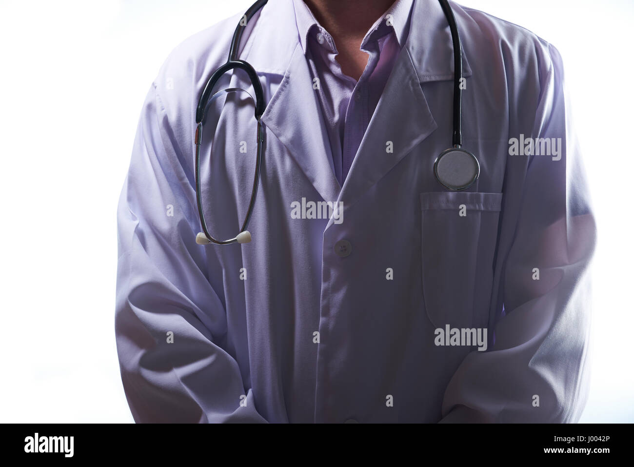 Close-up of doctor chest in uniform isolated on white background Stock ...