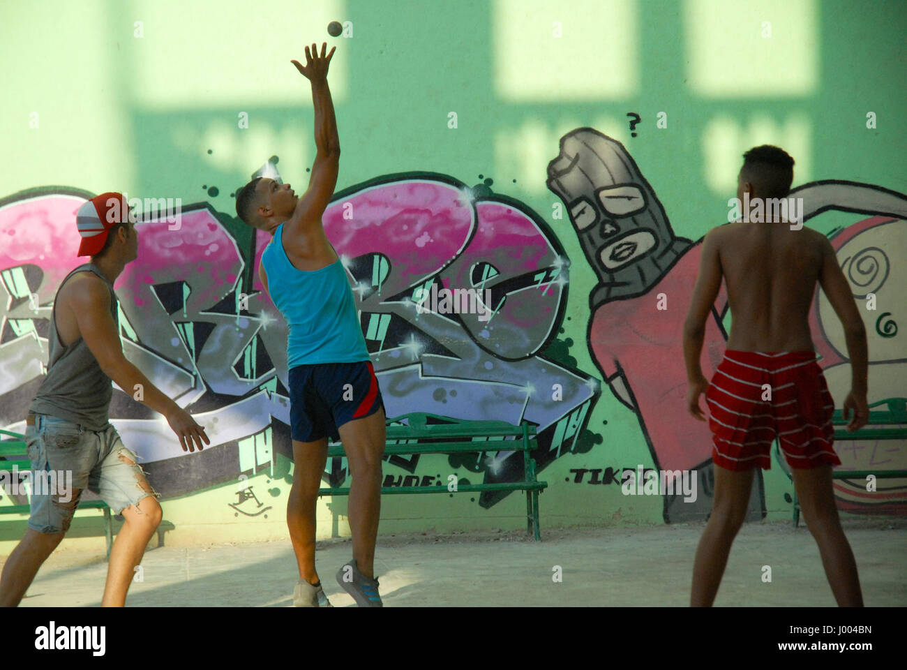 Young men playing handball on the streets of Havana, Cuba Stock Photo ...