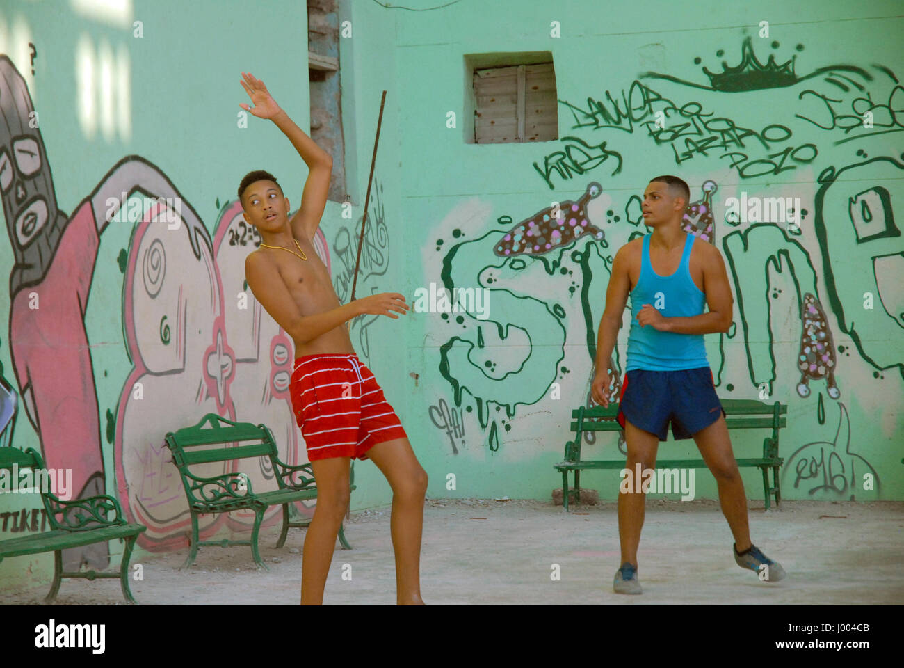 Young men playing handball on the streets of Havana, Cuba Stock Photo ...