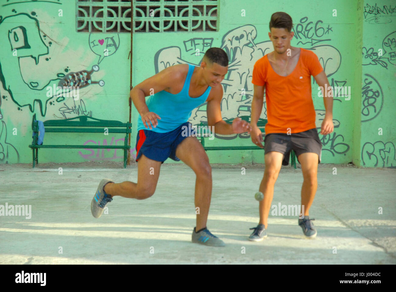 Young men playing handball on the streets of Havana, Cuba Stock Photo ...