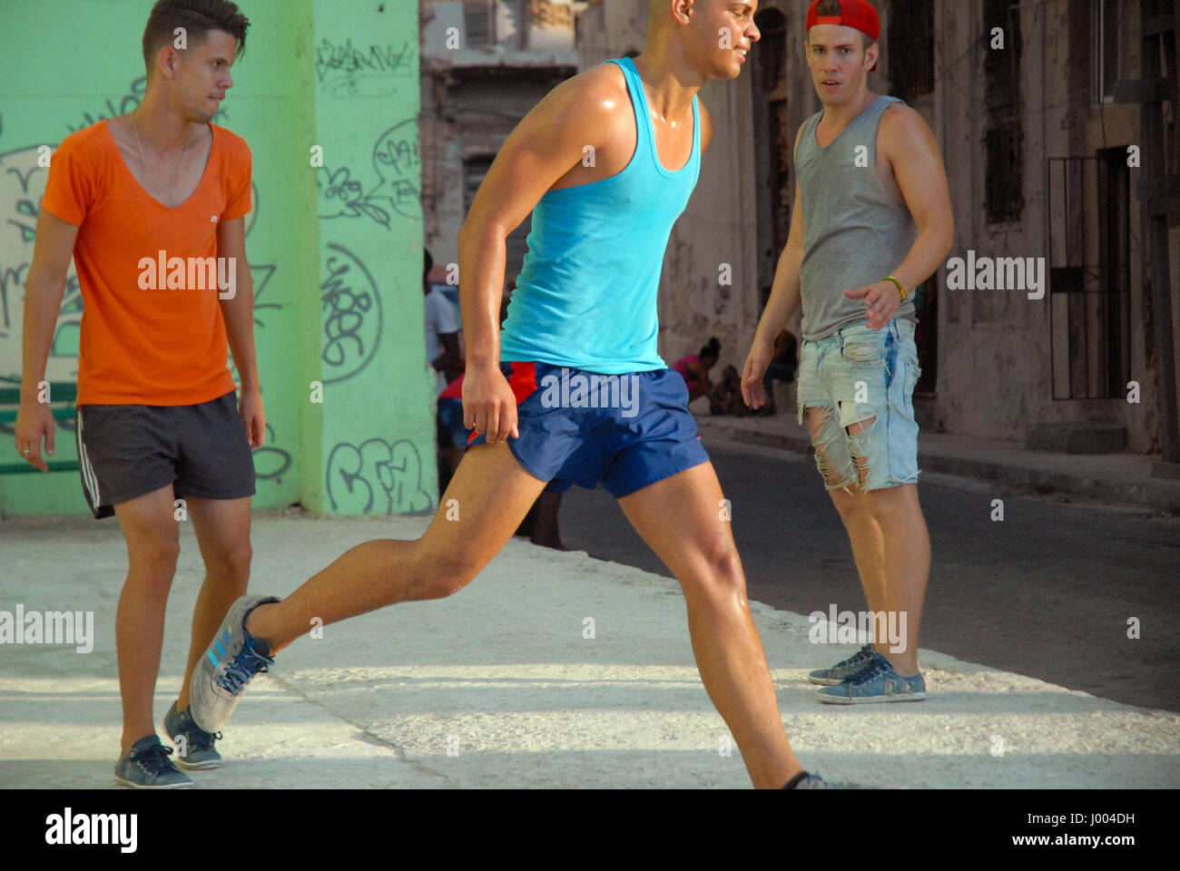 Young men playing handball on the streets of Havana, Cuba Stock Photo ...