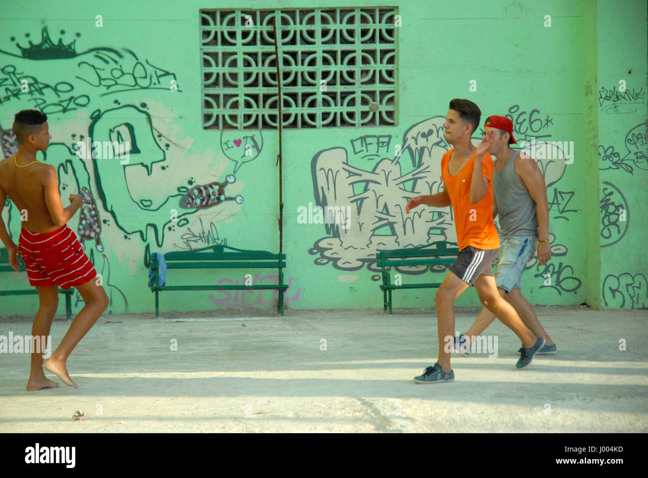 Young men playing handball on the streets of Havana, Cuba Stock Photo ...
