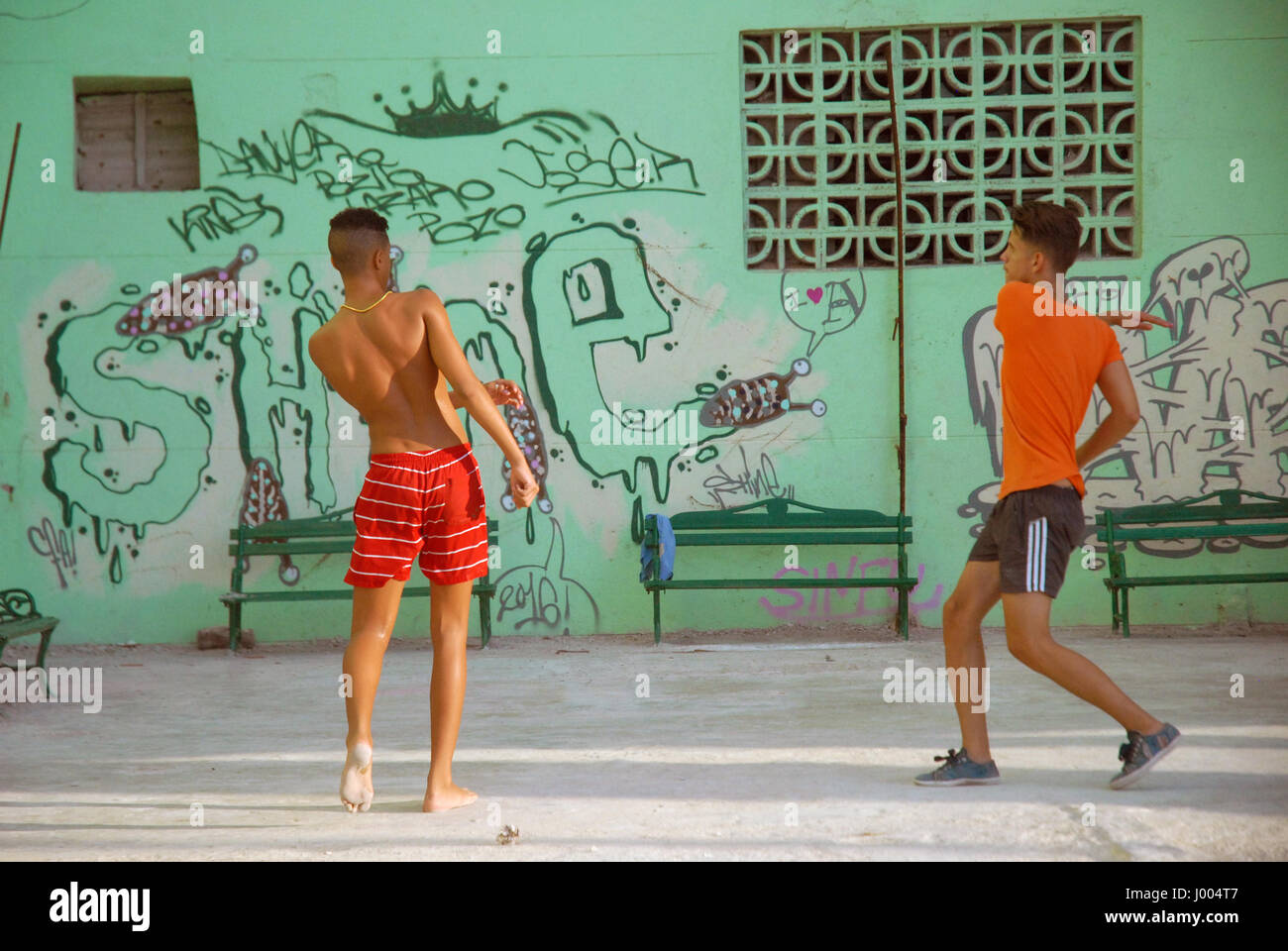 Young men playing handball on the streets of Havana, Cuba Stock Photo ...