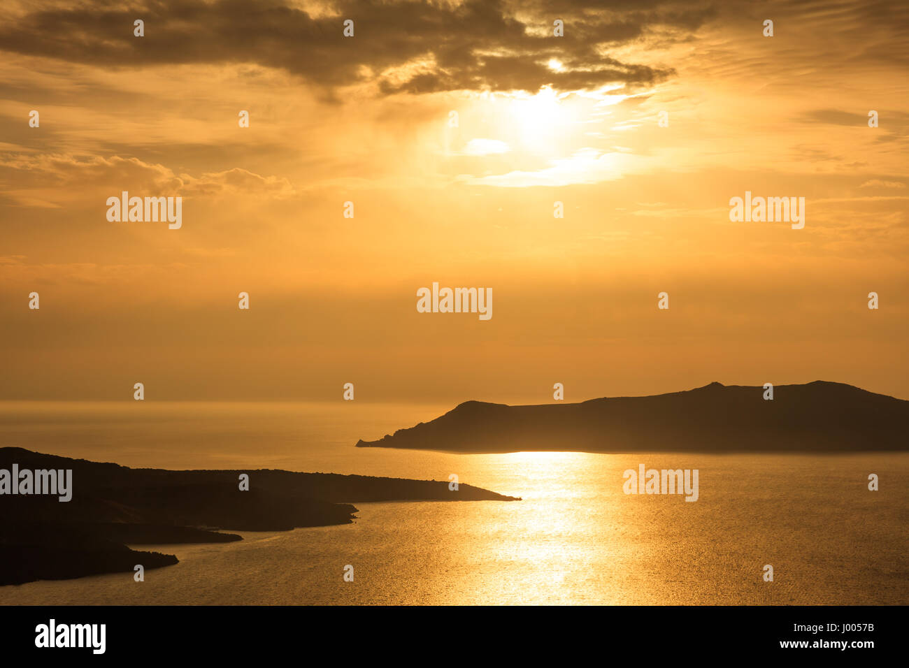 Beautiful sunset over Aegean sea at Santorini island Greece Stock Photo ...