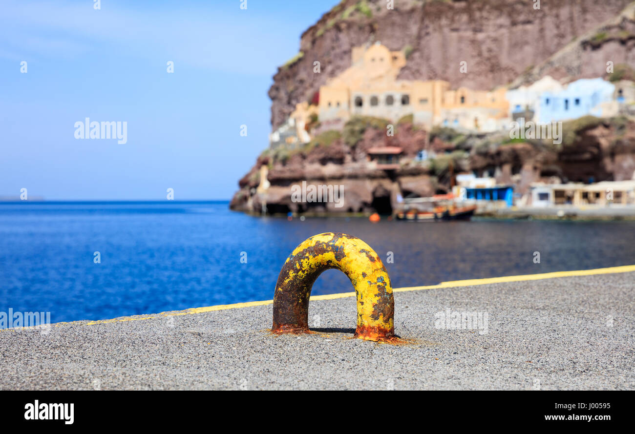 Santorini island, Greece - Rusty mooring at Fira old port Stock Photo ...