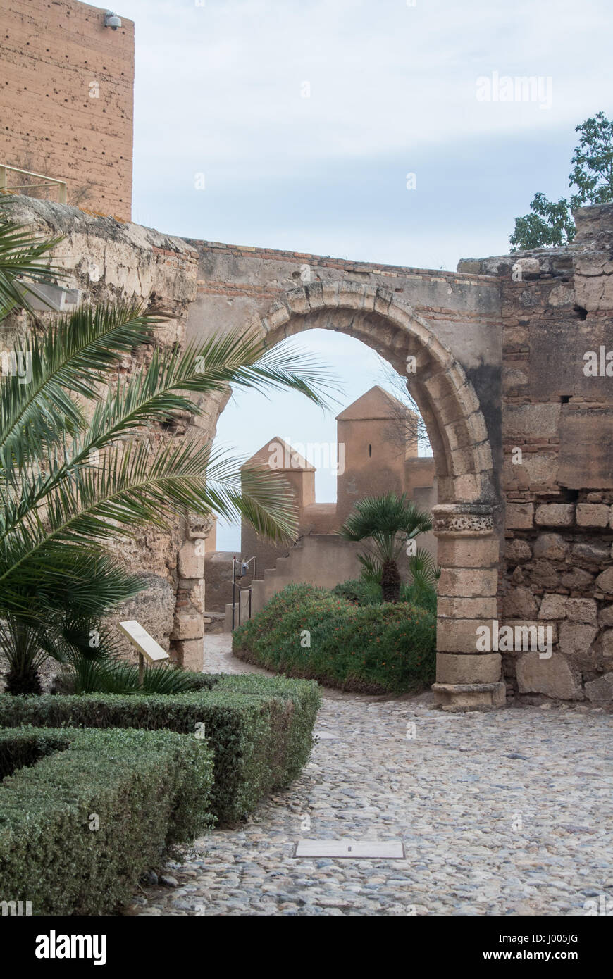 An arch at medieval moorish fortress Alcazaba, Andalusia, Spain Stock ...