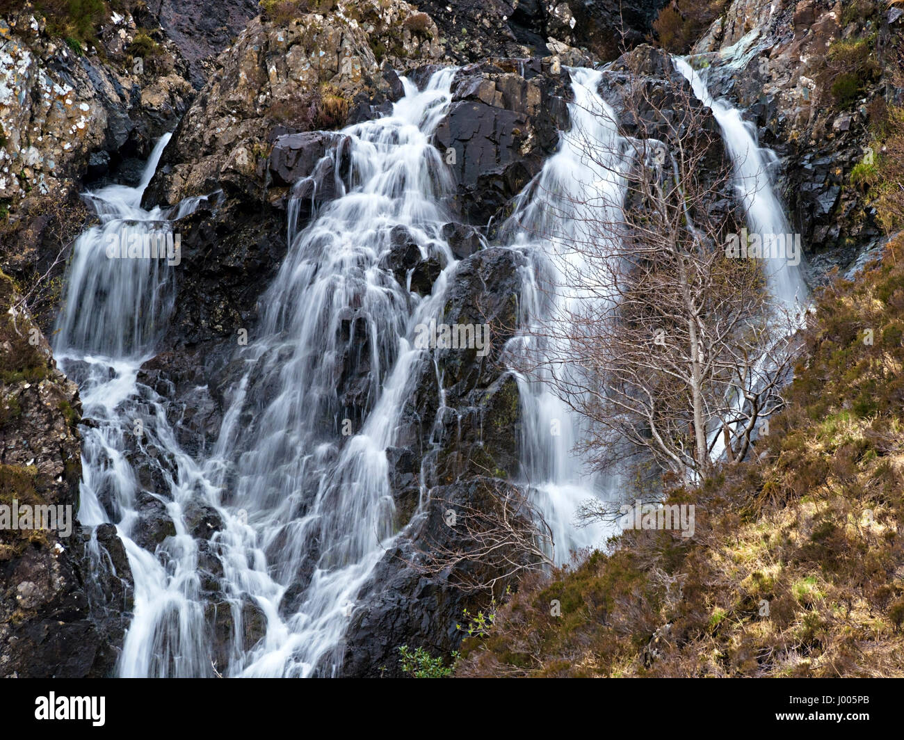 Waterfall in mountain stream of Allt na Dunaiche, Isle of Skye ...