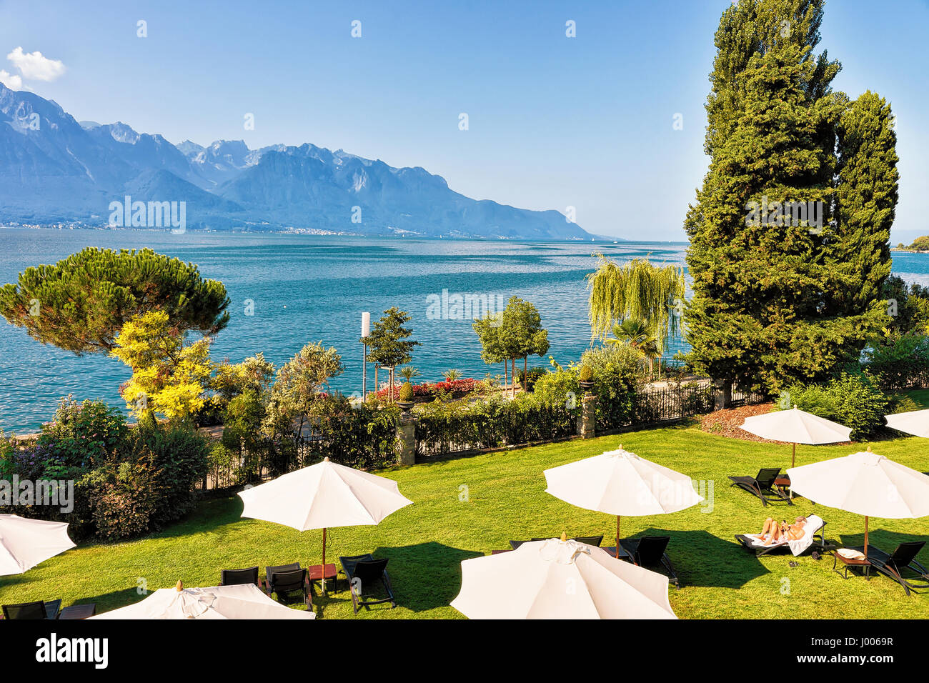 Garden at a hotel at Geneva Lake of Montreux, Vaud canton, Switzerland ...