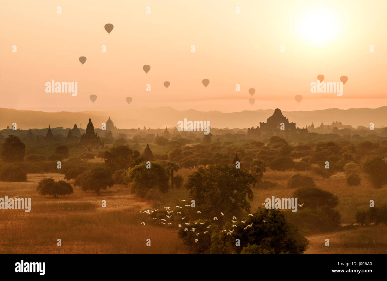 Sunrise hot air balloons over the temples of Bagan, Myanmar Stock Photo ...