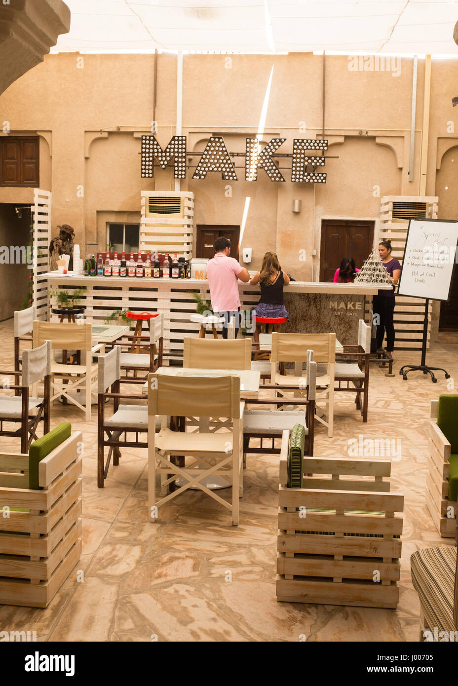 Dubai cafe young people hi-res stock photography and images - Alamy