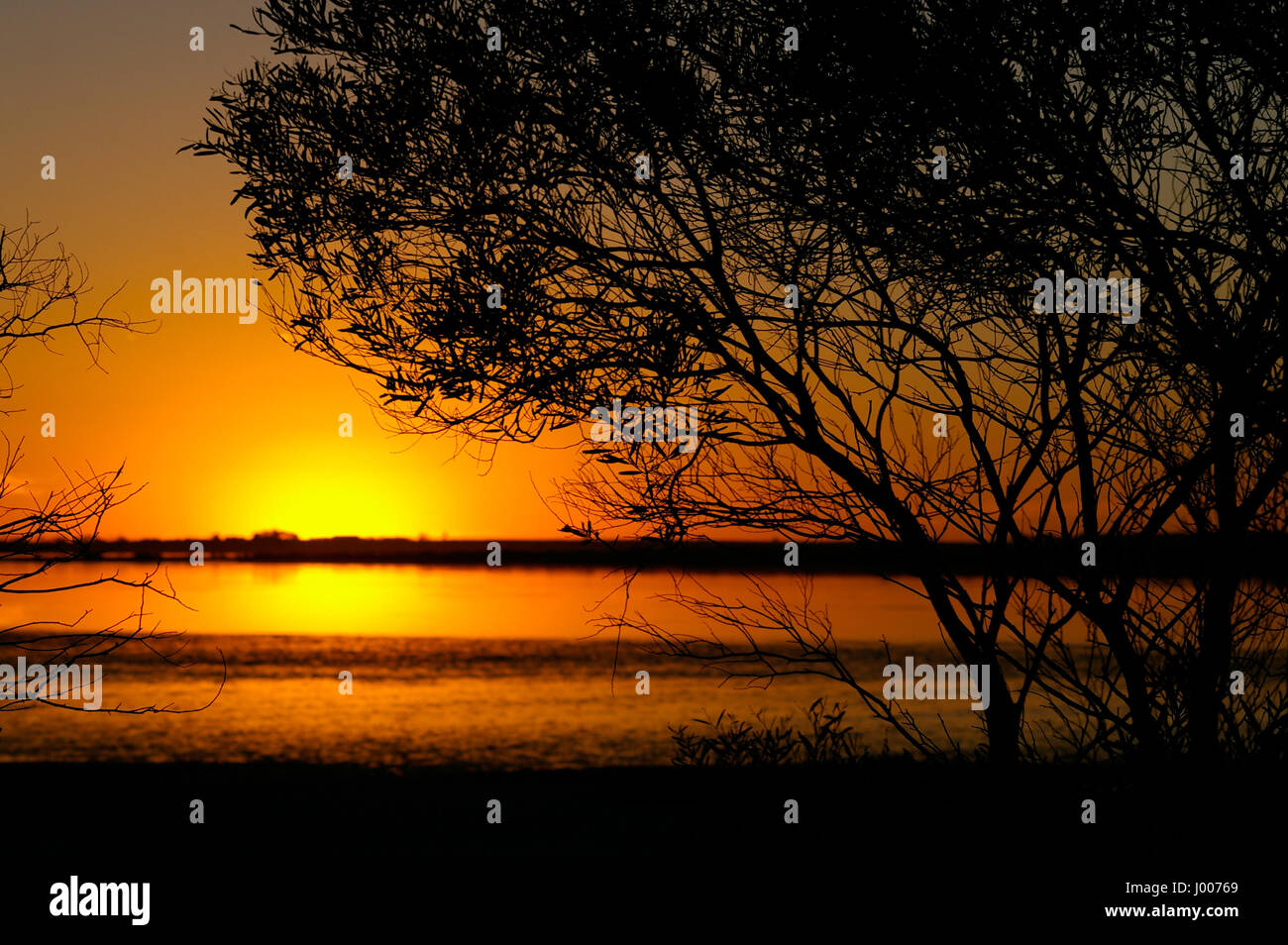A beautiful orange Sunset looking outwards to the Southern Ocean from ...