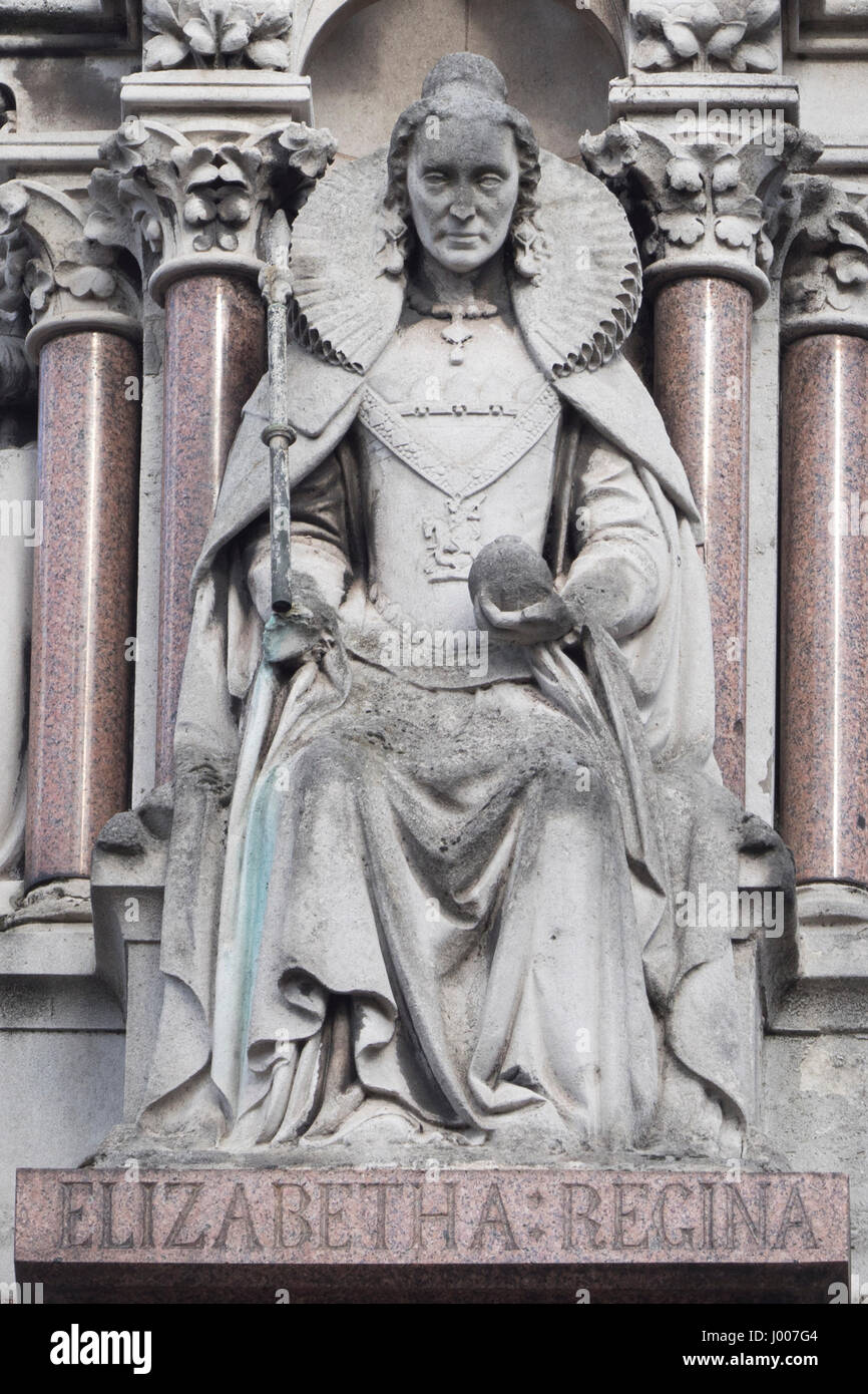 Statue of Queen Elizabeth I of England on top of the memorial to pupils ...