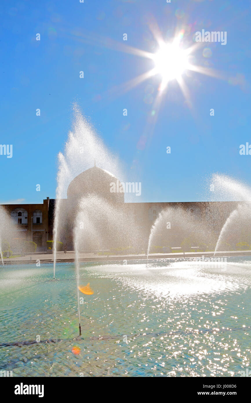 in iran old square mosque and fountain water backlight Stock Photo - Alamy
