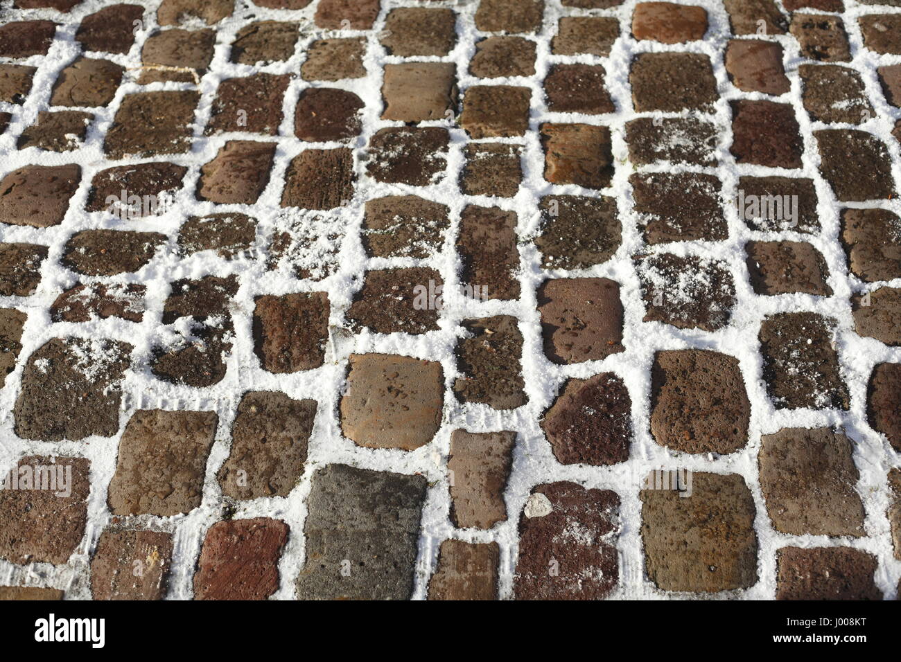 paving stones with snow coated Stock Photo - Alamy