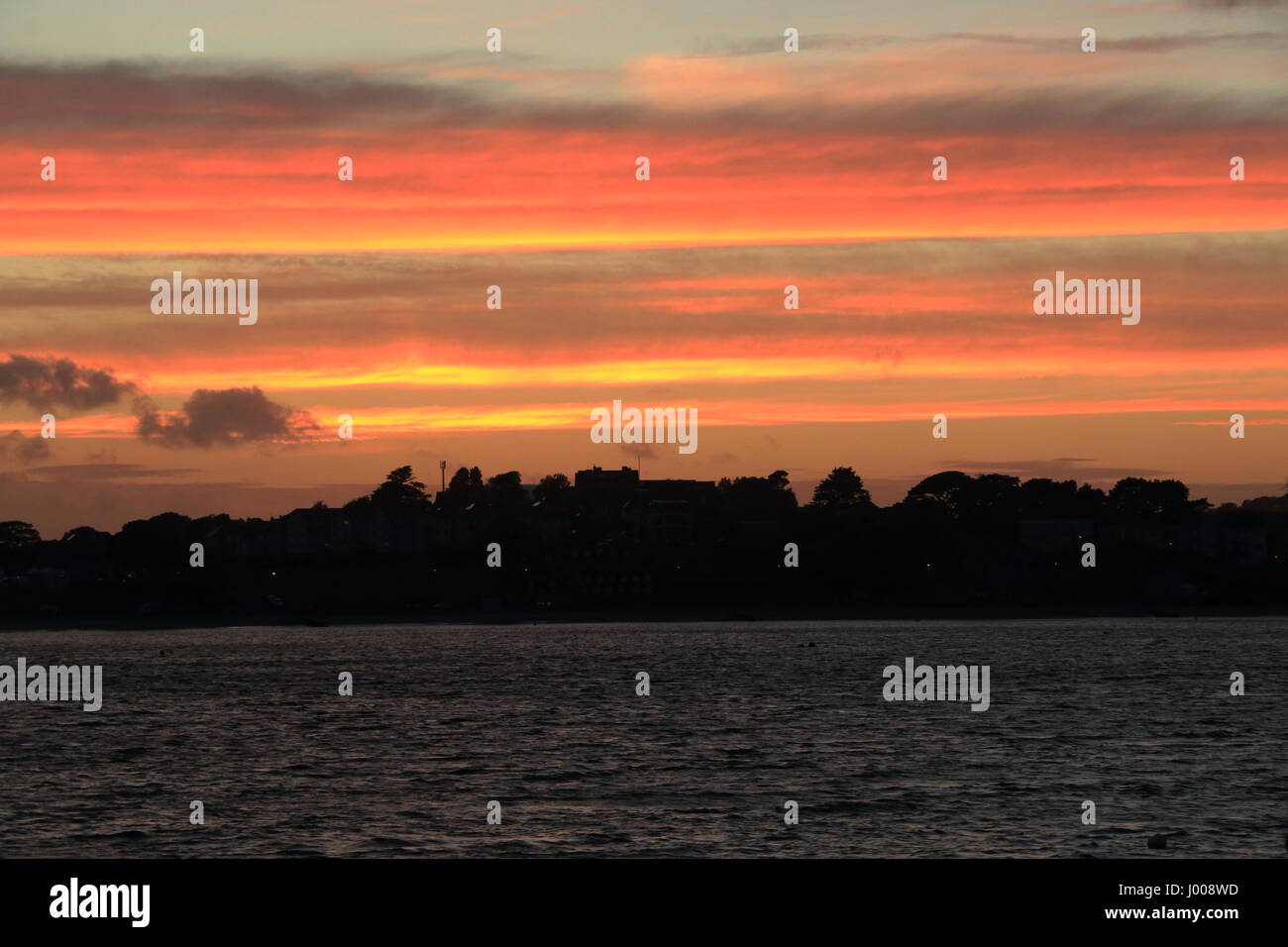 Swanage at sunset Stock Photo - Alamy