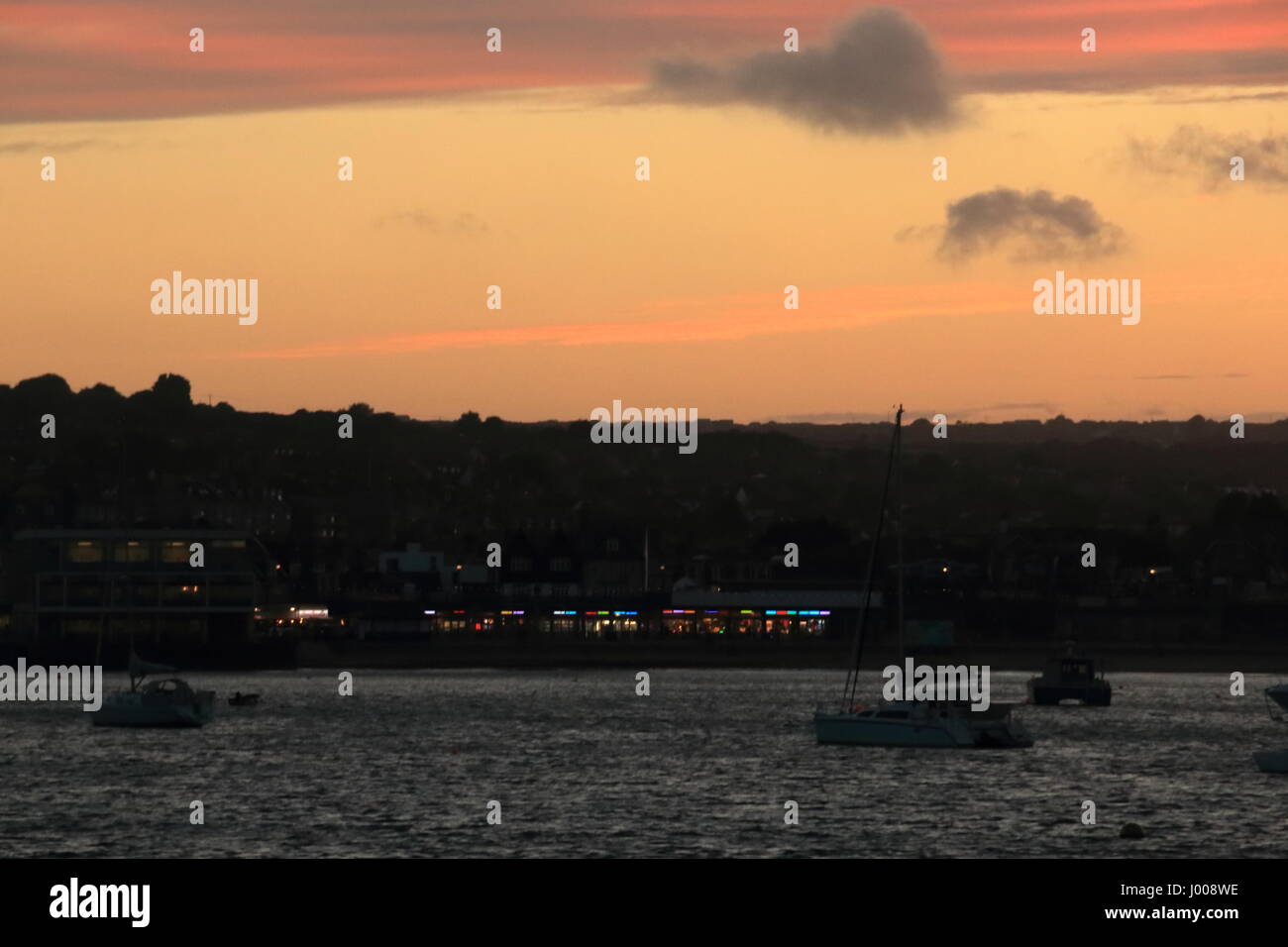 Swanage at sunset Stock Photo - Alamy