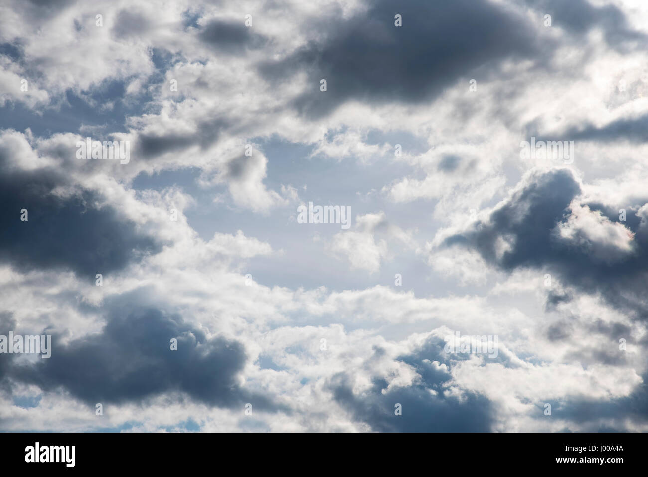 Spring cloudy sky, the space in the center of the image Stock Photo - Alamy