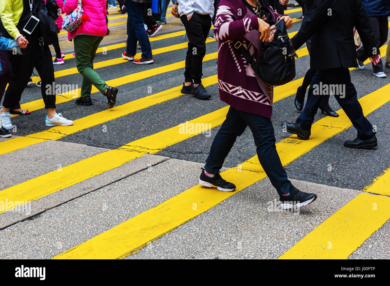 picture of a crowd of people crossing a city street Stock Photo - Alamy