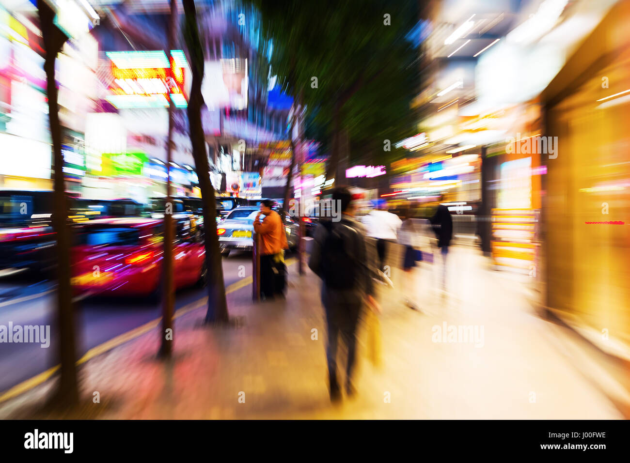 street scene in Hong Kong at night with creative zoom effect Stock ...