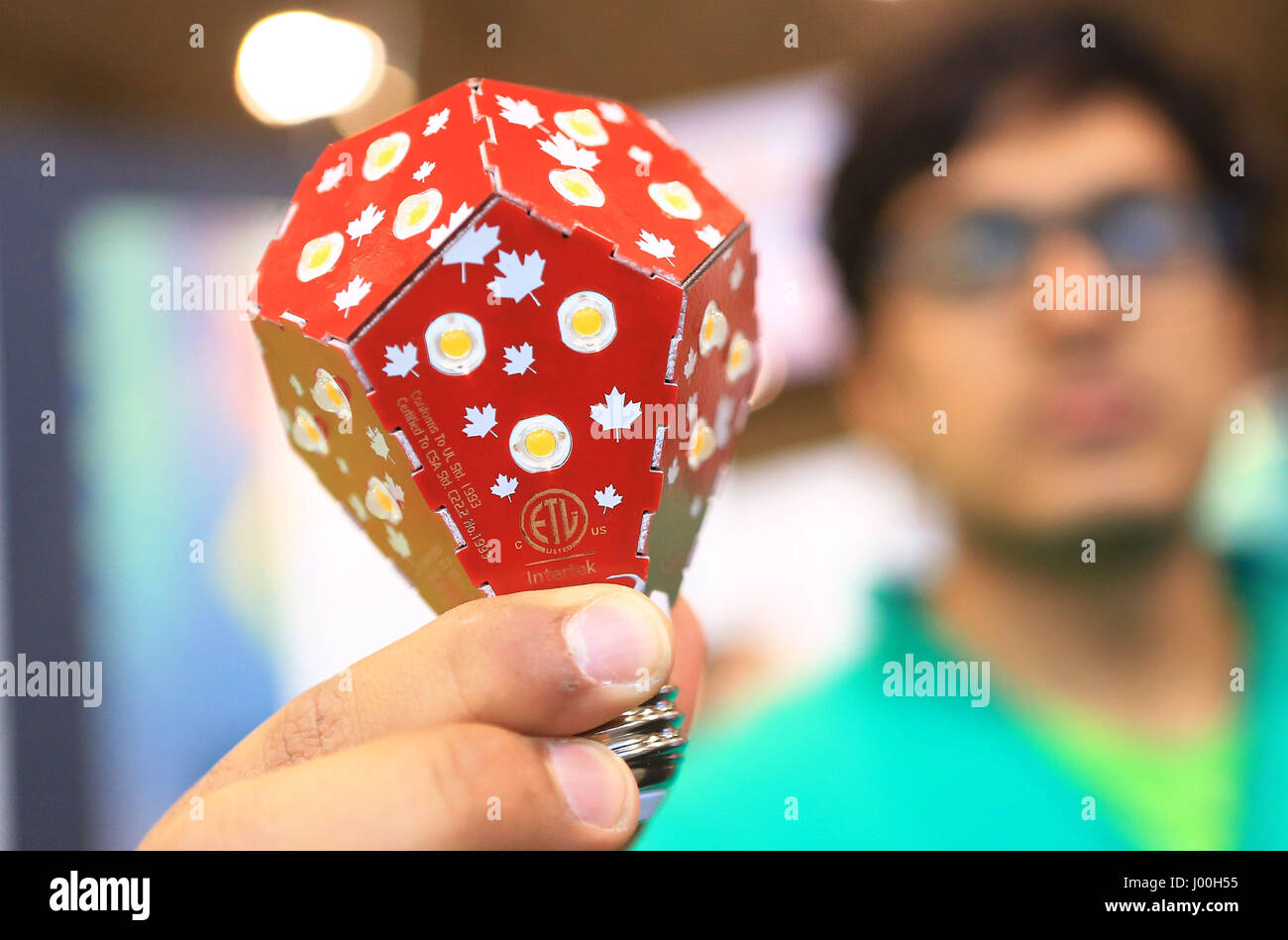 Toronto, Canada. 7th Apr, 2017. An exhibitor shows the new designed LED ...