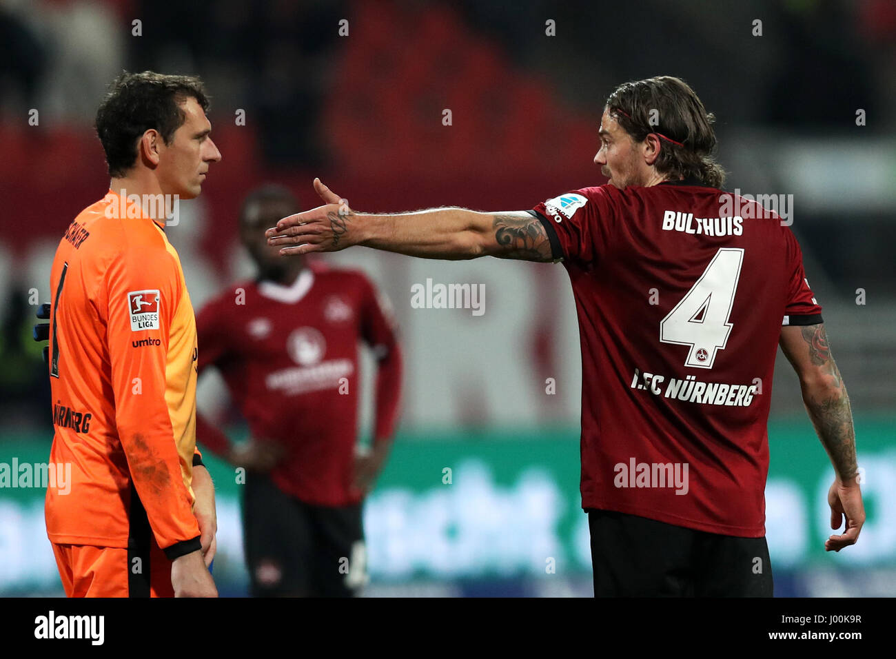 Nuremberg, Germany. 07th Apr, 2017. Nuremberg's Dave Bulthuis (R) talks ...