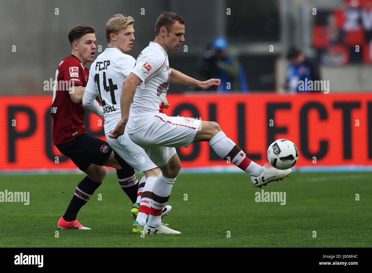Nuremberg, Germany. 07th Apr, 2017. Nuremberg's Patrick Kammerbauer (L ...