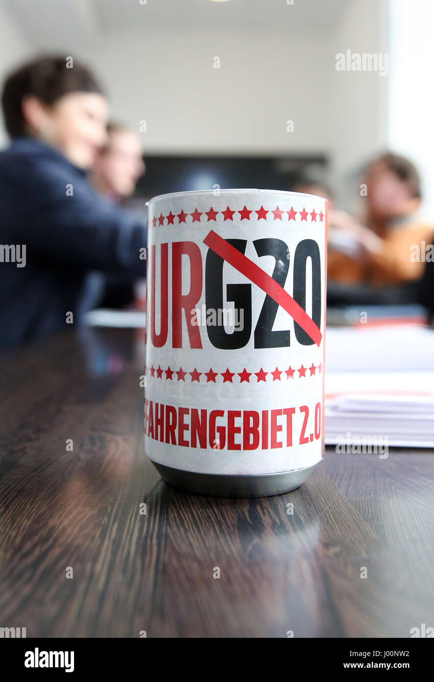 A donation box with crossed-out lettering that reads 'G20' seen at the ...
