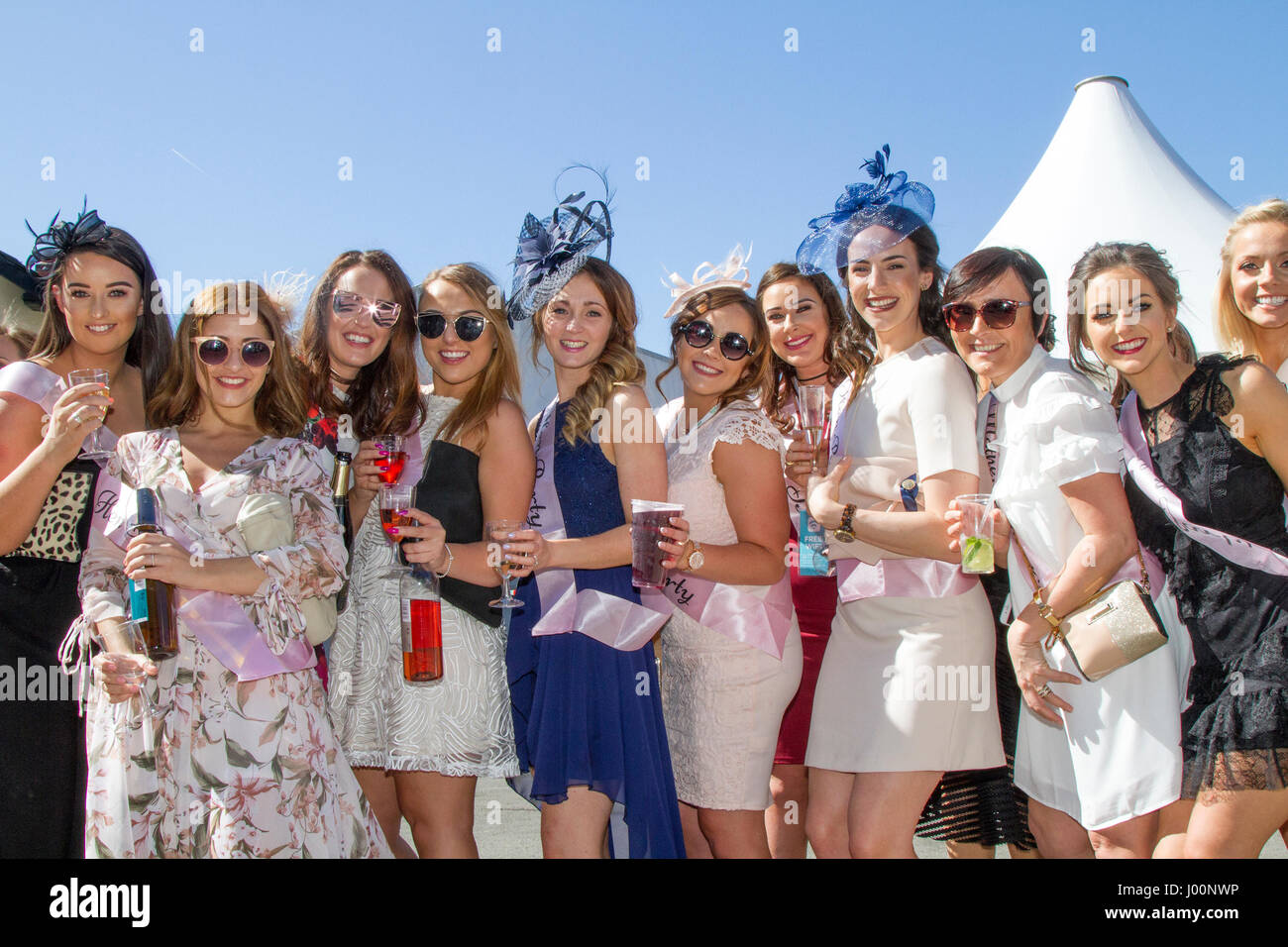 Glamorous women in fancy outfits, ladies in suits, floral dresses, hats ...