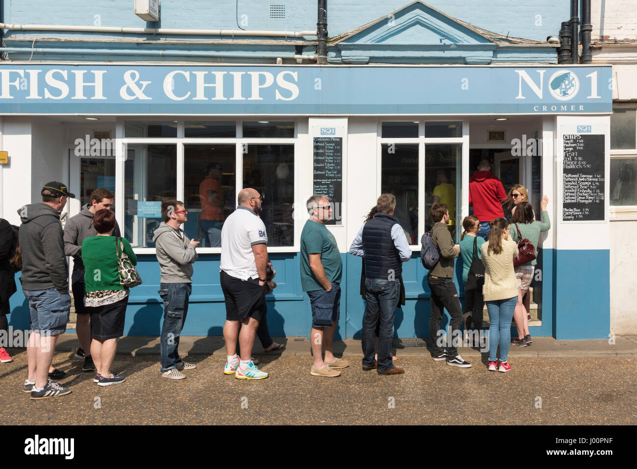 Cromer Norfolk UK 8th April 2017. People queue for fish and chips and ...