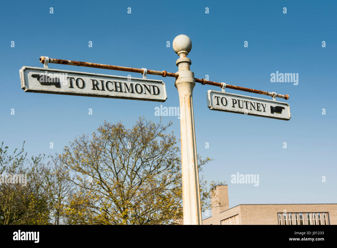 Old finger road sign to Putney and Richmond on the Lower Richmond Road ...