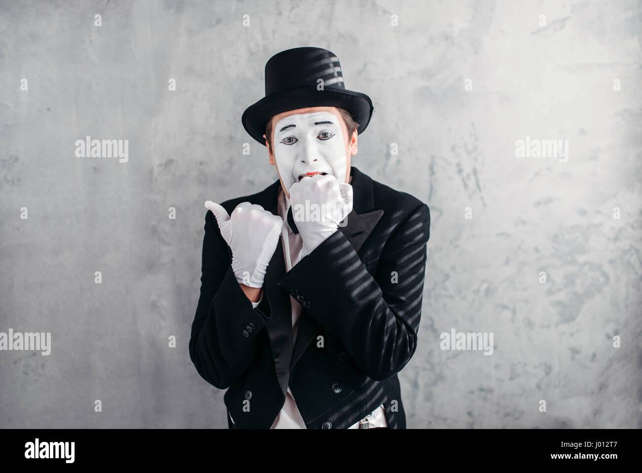 Mimic Male Person With White Makeup Mask Comedy Actor In Suit Gloves And Hat Pantomime