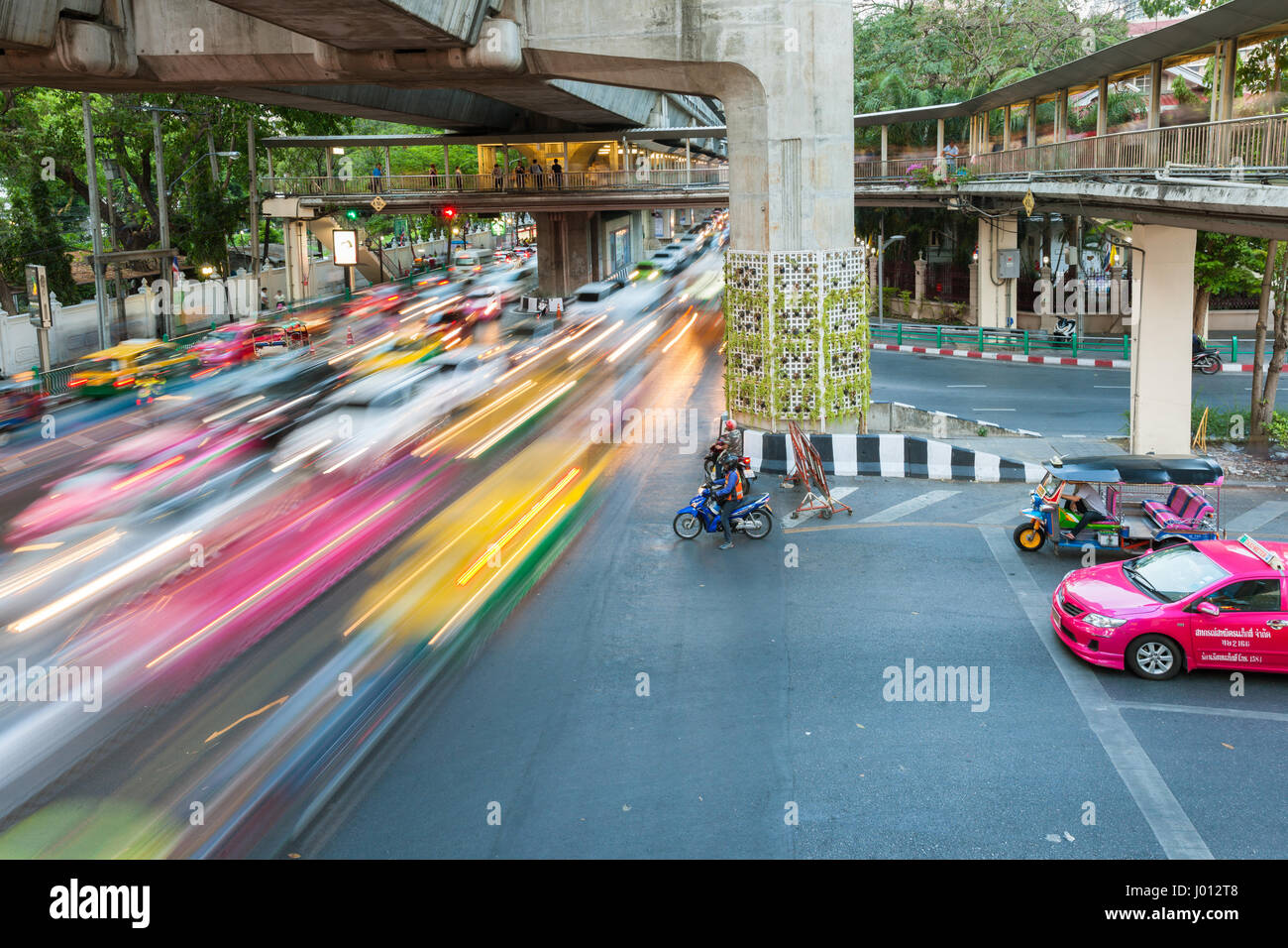 Bangkok, Thailand - April 22, 2016: Cars moving down the road in the heavy traffic conditions at ...