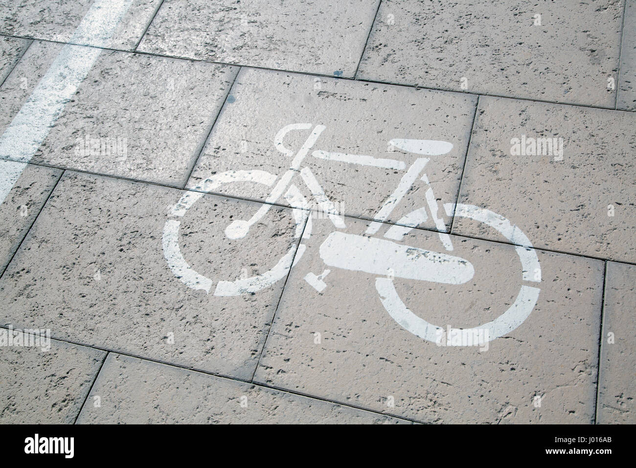 Bike Lane Symbol on Cycle Path Stock Photo - Alamy