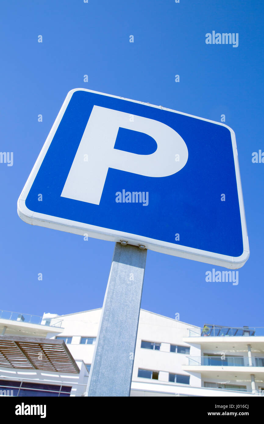 Blue Parking Sign in Urban Setting Stock Photo - Alamy