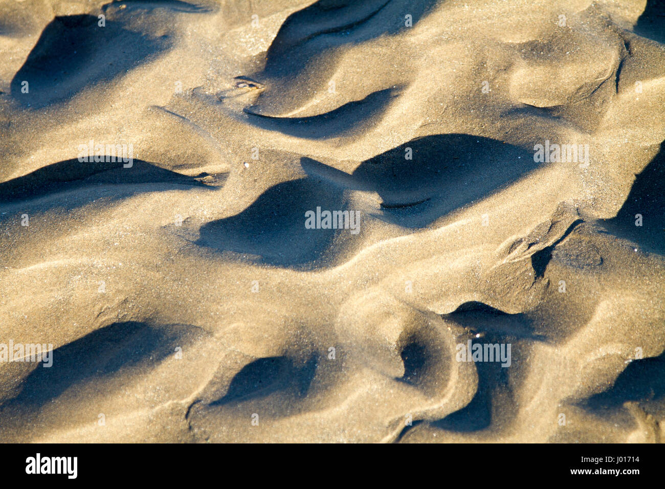 Sandy beach patterns with great texture and ridges Stock Photo - Alamy