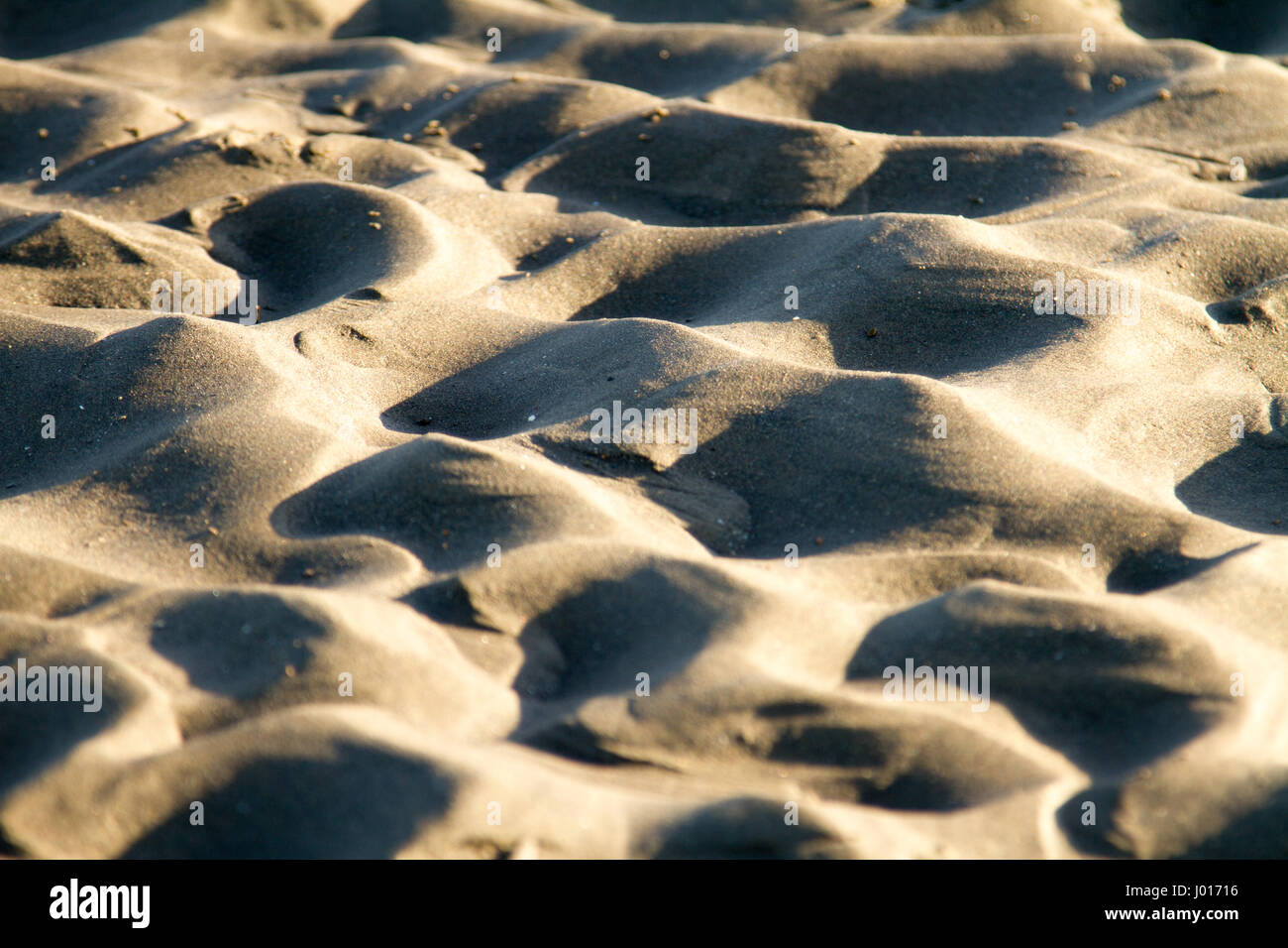 Sandy beach patterns with great texture and ridges Stock Photo - Alamy