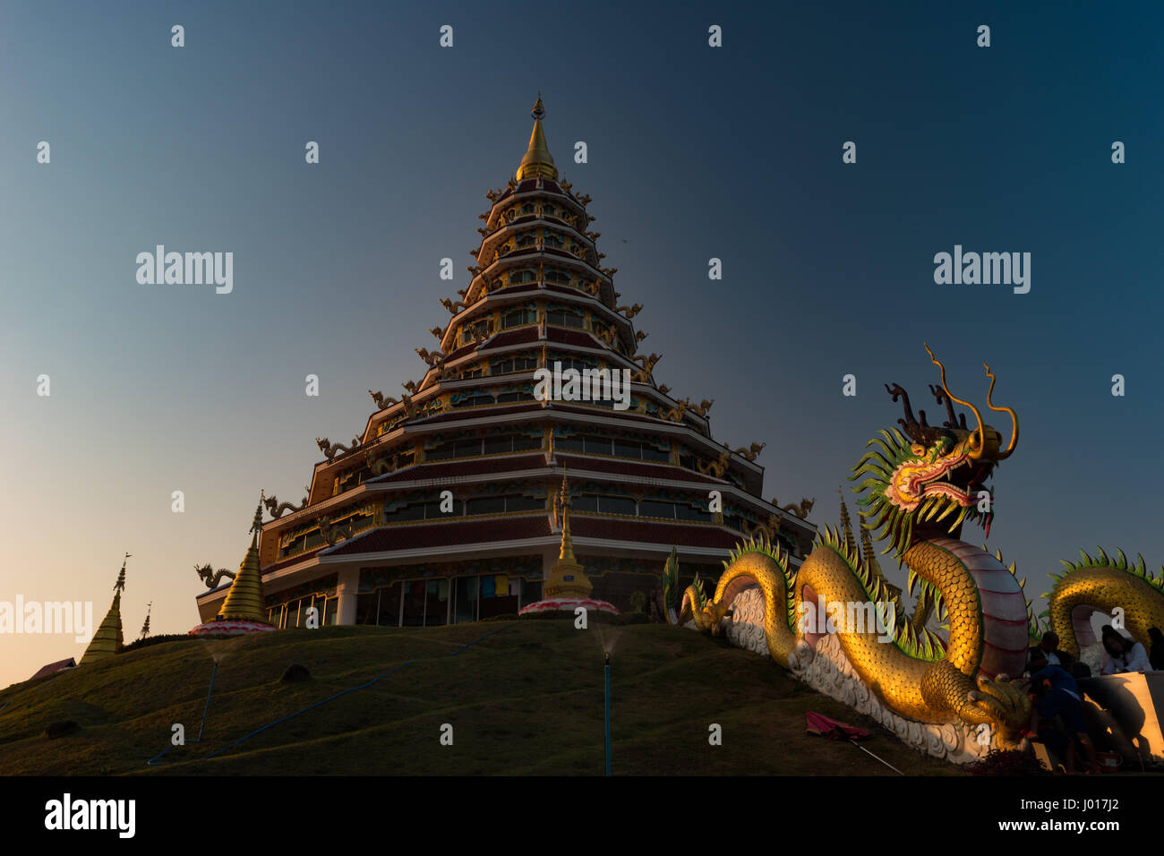 Golden Pagoda nine tier with dragon texture at Chinese temple - wat ...