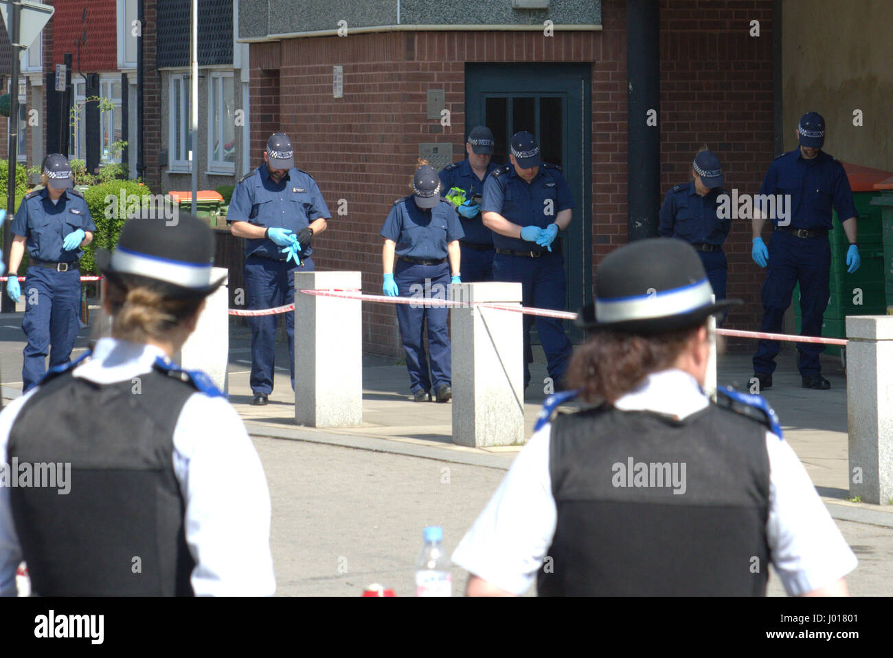 Police searching crime scene for evidence as part of murder inquiry in ...