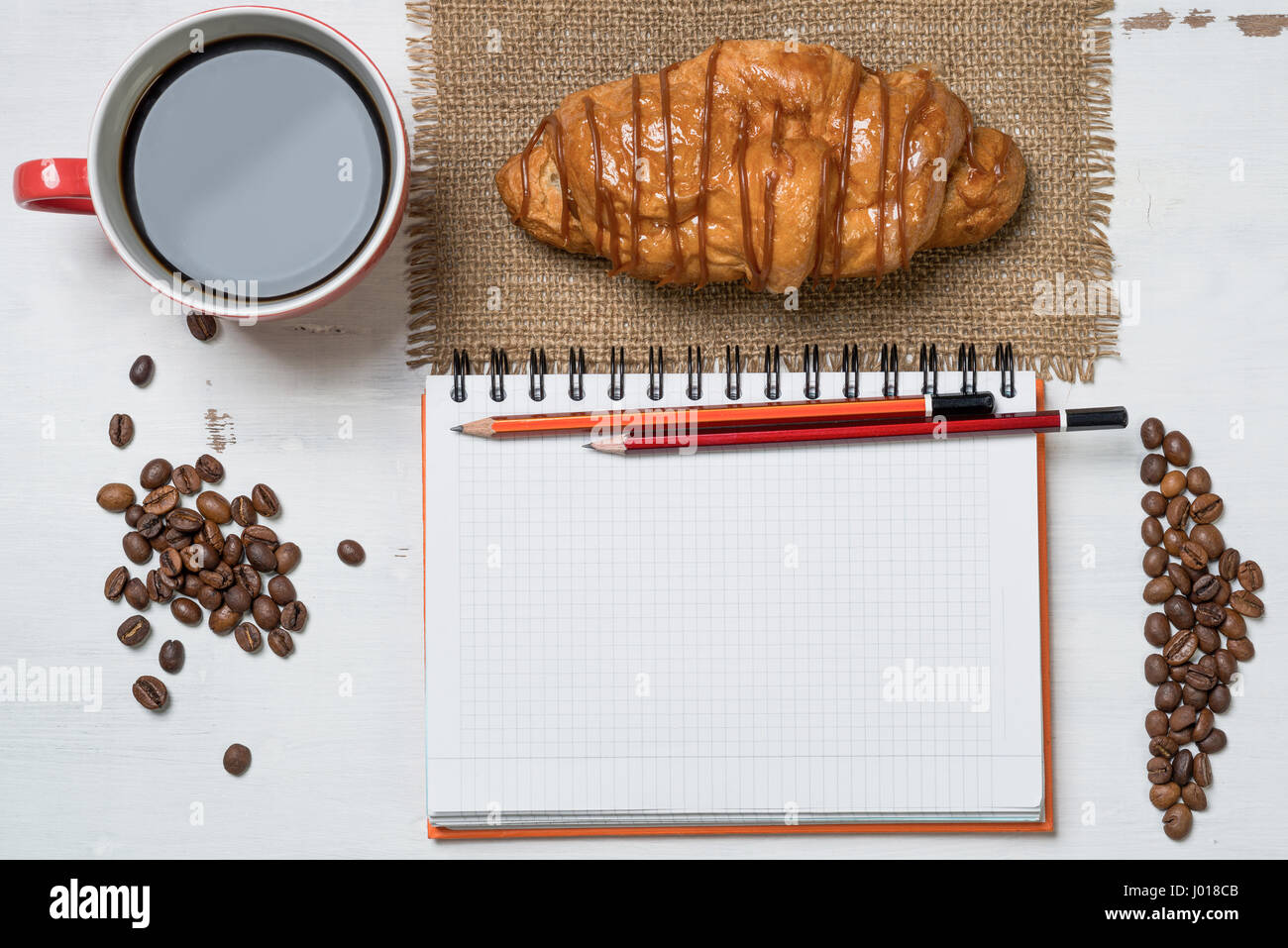 Coffee break with snack Stock Photo - Alamy